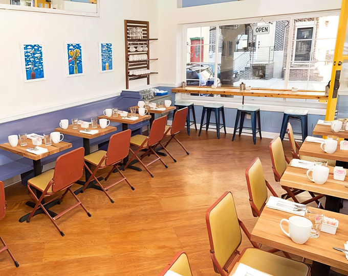 Clean lines, natural light, and tables set with anticipation. A dining room that lets the food be the undisputed star.