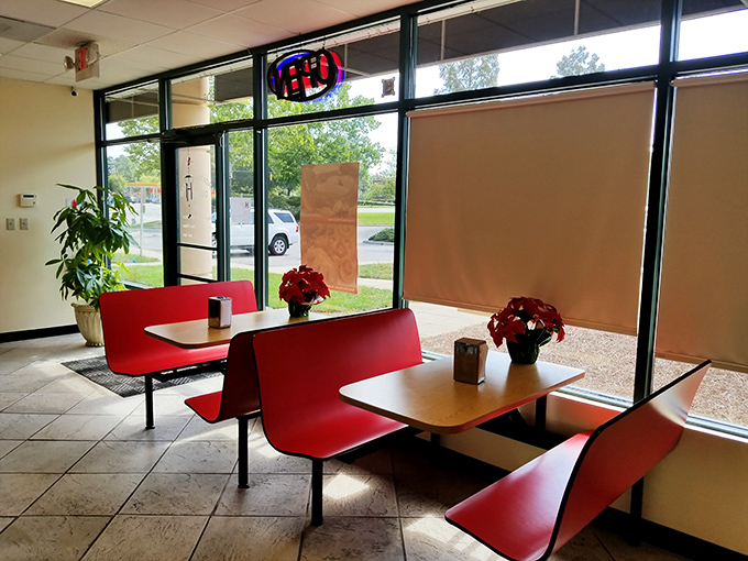 The dining area keeps it simple with bright red booths and natural light. No distractions from the serious business of donut appreciation happening at each table. 