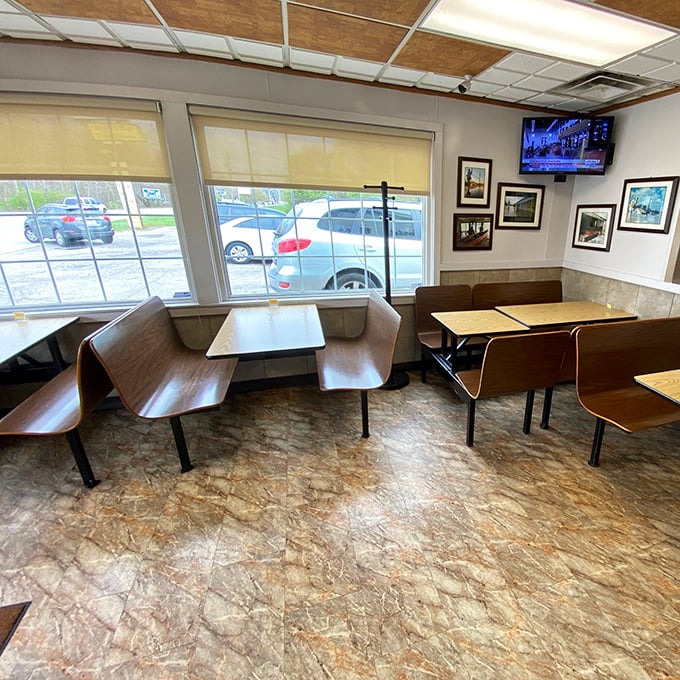 Simple booths, basic tables, and zero pretension. This is where memories are made between bites of extraordinary ordinary food.