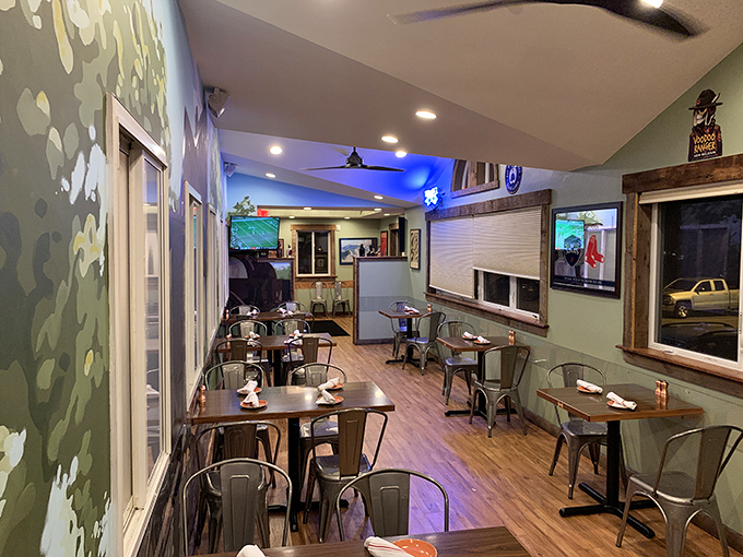 The dining area balances rustic charm with modern comfort, like if Joanna Gaines designed a space specifically for mac and cheese enjoyment.