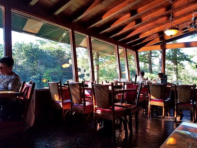 Floor-to-ceiling windows frame Mirror Lake like living paintings, turning every table into the best seat in the house.