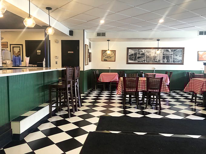 The black and white checkered floor isn't just nostalgic&mdash;it's the runway models walk on in my pizza dreams.
