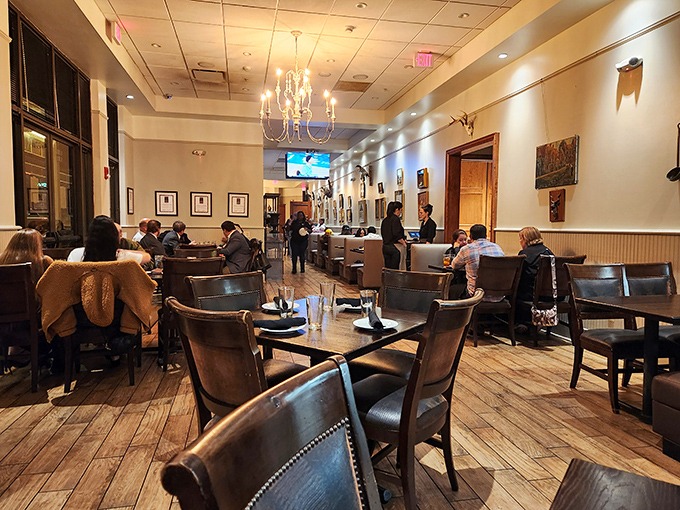 Evening at The Manship: Soft lighting, elegant chandeliers, and the gentle hum of satisfied diners create an atmosphere of culinary contentment.