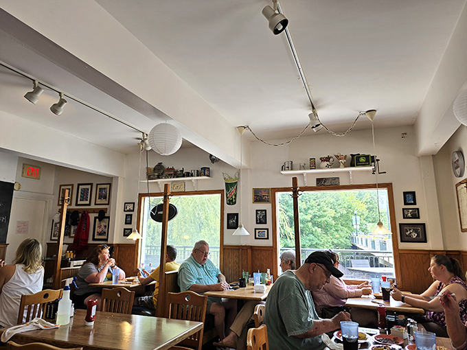 Windows flood the dining room with natural light, creating a warm atmosphere where framed memories on the walls tell stories of Gahanna's past.