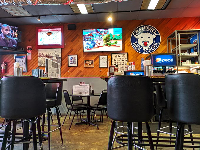 Classic bar seating where strangers become temporary breakfast companions, united by coffee and the mutual appreciation of a well-cooked egg.