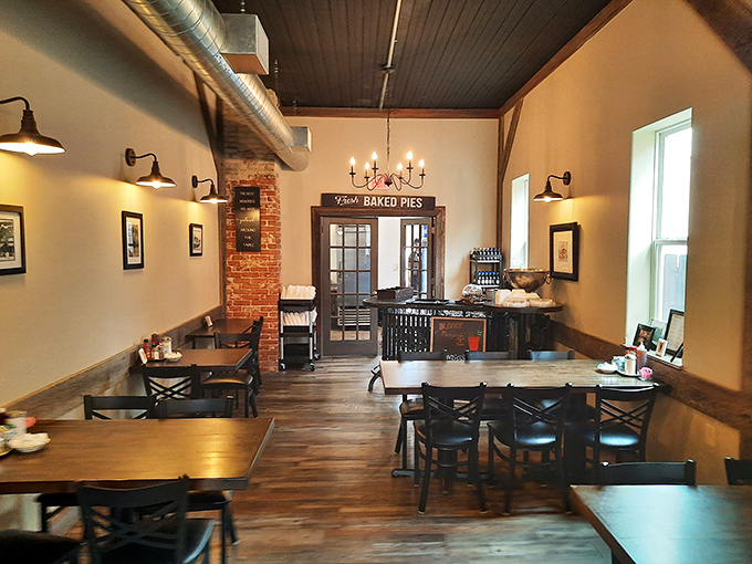 Rustic wooden tables, exposed brick, and warm lighting create the stage where pie memories are made and diet resolutions come to die.