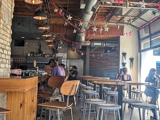 Colorful papel picado and exposed ductwork shouldn't work together, but somehow they create the perfect atmosphere for serious taco consumption.