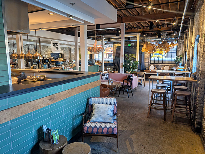Teal subway tiles and warm wood create a space that feels both trendy and timeless. The perfect backdrop for taco-fueled conversations.