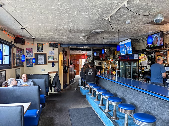 Classic diner-style seating meets neighborhood pub vibes. Those blue barstools have supported decades of satisfied customers and their fish-filled bellies.