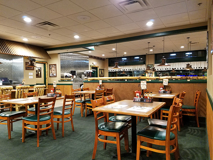 The dining area balances rustic charm with comfortable seating, creating the perfect backdrop for breakfast conversations that stretch well into lunch.