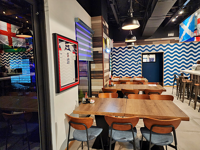 Blue wave patterns and wooden tables create that perfect "seaside pub meets Texas Gulf Coast" vibe that somehow makes perfect sense after your first pint.