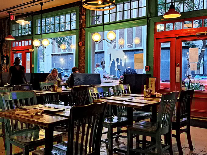 The dining area feels like that cool friend's apartment&mdash;the one who somehow makes mismatched furniture look intentional and vintage windows seem architectural.