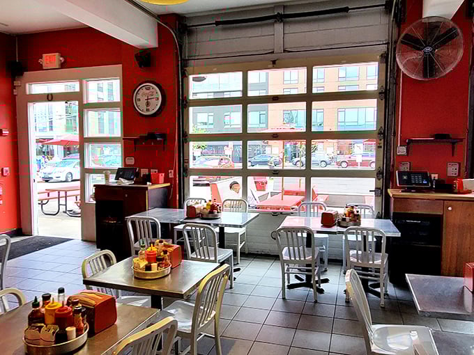 Garage doors that open to let Boston in, giving diners front-row seats to city life while enjoying the show on their plates.