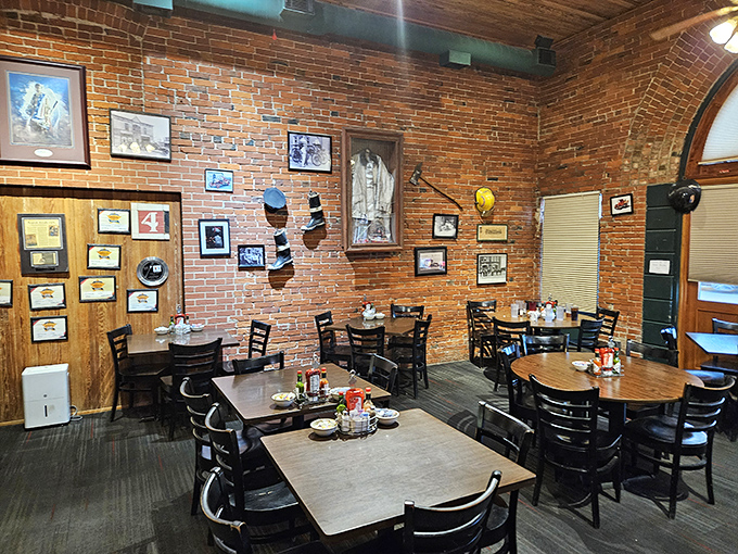 Wooden tables, brick walls, and firefighting memorabilia create an atmosphere as authentic as the food. History you can eat in.