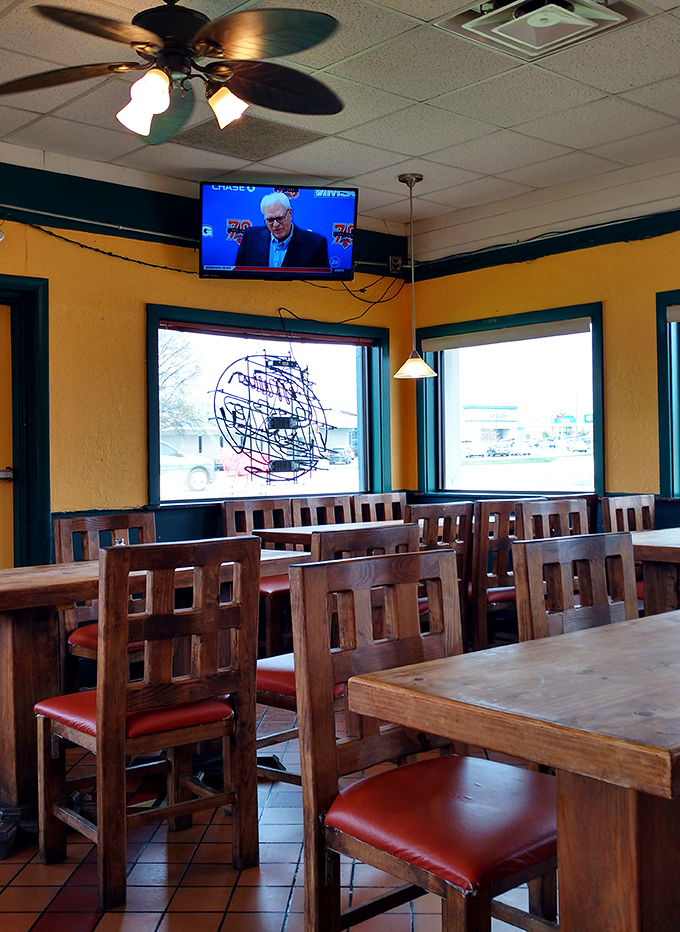 Wooden chairs and yellow walls create the perfect backdrop for culinary memories. This isn't dining&mdash;it's a cultural immersion with table service.