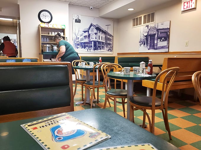 History watches over your breakfast from those wall photos. They've seen generations bond over pancakes and life's big decisions.