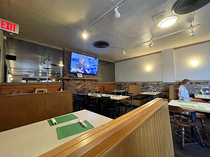 The dining area balances cozy and spacious, where every booth feels like the best seat in the house.