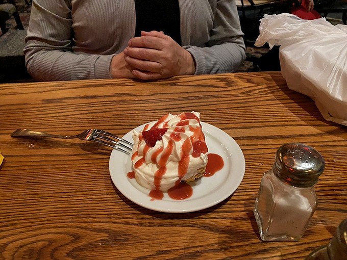 When cheesecake wears a strawberry beret, it's not just dessert&mdash;it's a sweet finale that makes you contemplate ordering a second slice "for the road."