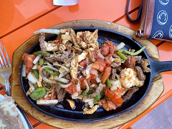 Sizzling fajitas on a cast iron skillet&mdash;the dish that makes every head turn when it passes by. Dinner and a show in one glorious package.