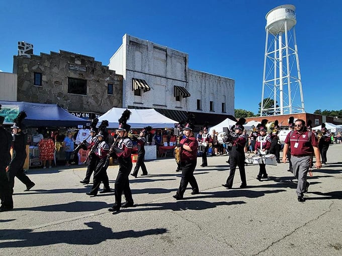 The town square transforms during festival season, when marching bands and community pride create the kind of authentic celebration no theme park could ever replicate.