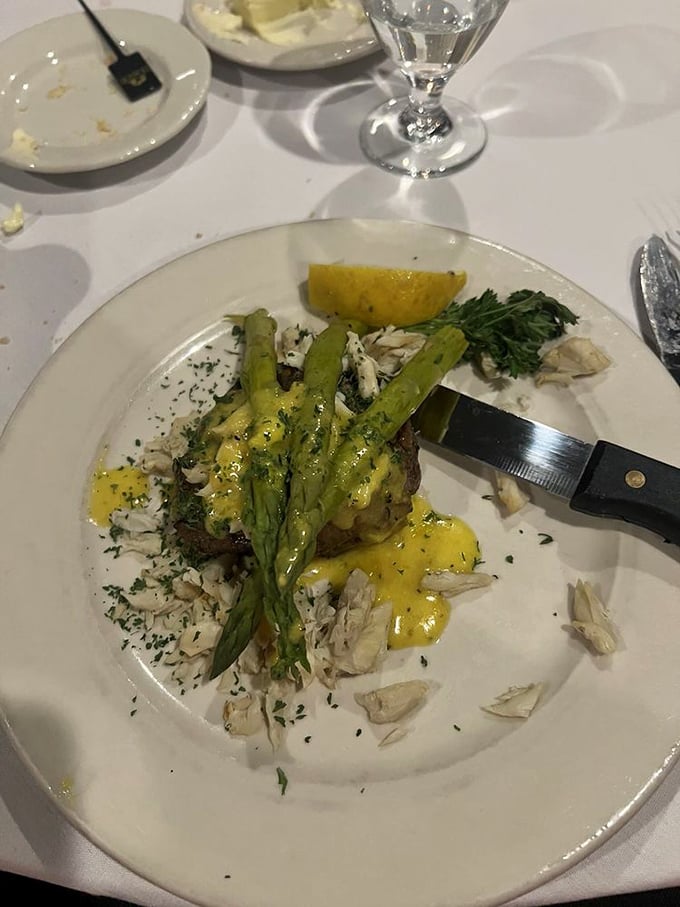 Filet Oscar: Where surf meets turf in the most elegant relationship since Bogart met Bacall. Tender beef topped with asparagus and crab beneath hollandaise.