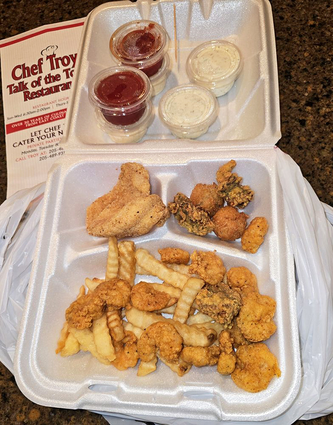 The seafood sampler to-go proves good things come in styrofoam packages&mdash;especially when those things include perfectly fried coastal treasures. 