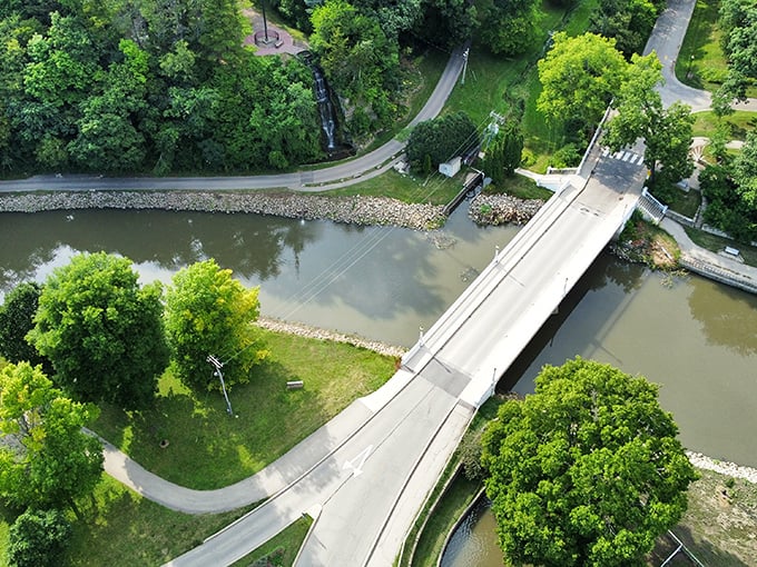 This bridge connects more than just two sides of the park&mdash;it links generations of Freeport memories. No Instagram filter needed for this postcard-worthy scene.