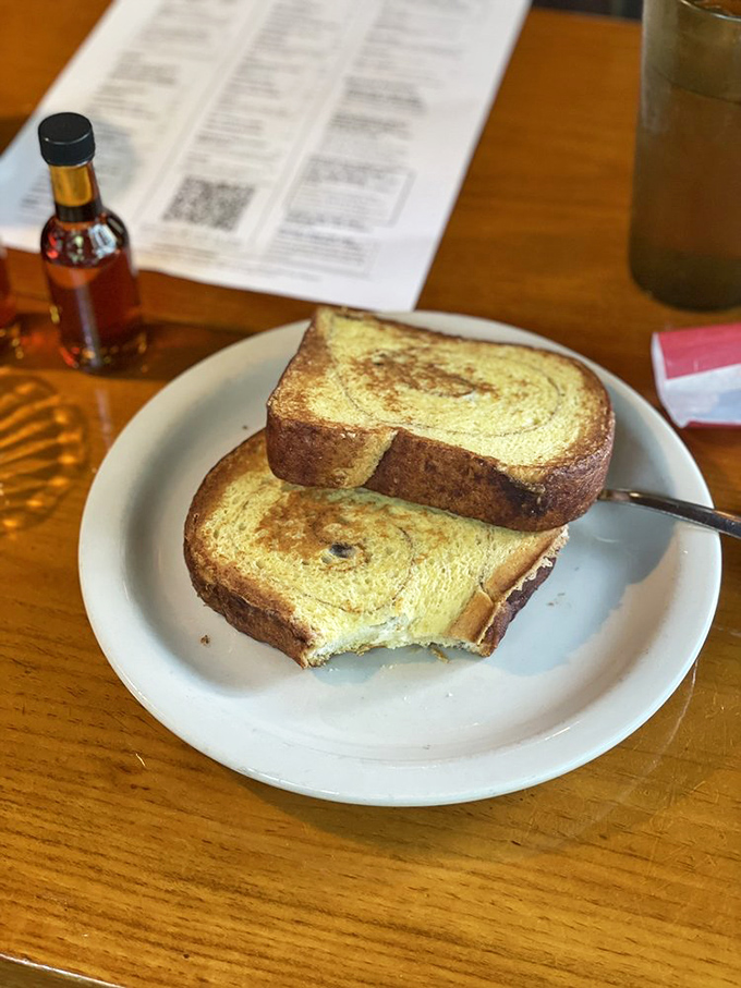 French toast that's achieved the impossible: crispy edges with a custardy center that makes you forget all other breakfast options. 