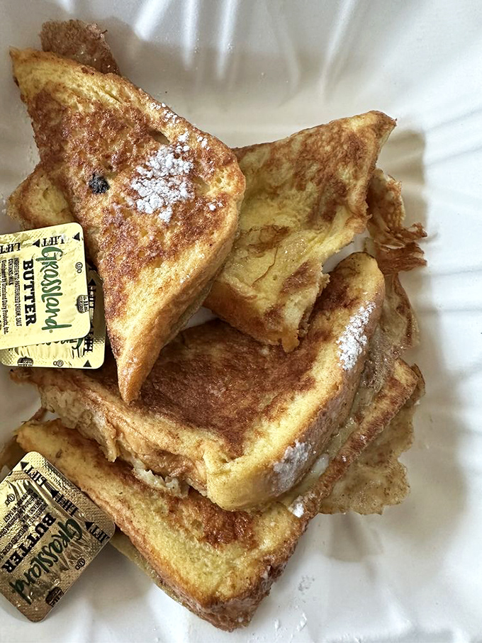 French toast that doesn't need to call itself "artisanal" or "brioche-based" to deliver that perfect custardy interior and golden exterior.