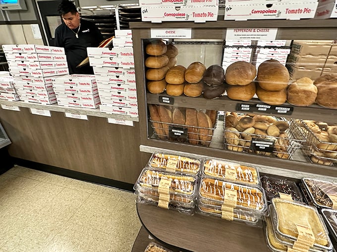 The bread counter, stacked with fresh-baked loaves, represents carbohydrate heaven&mdash;each one promising to elevate your sandwich game to legendary status.