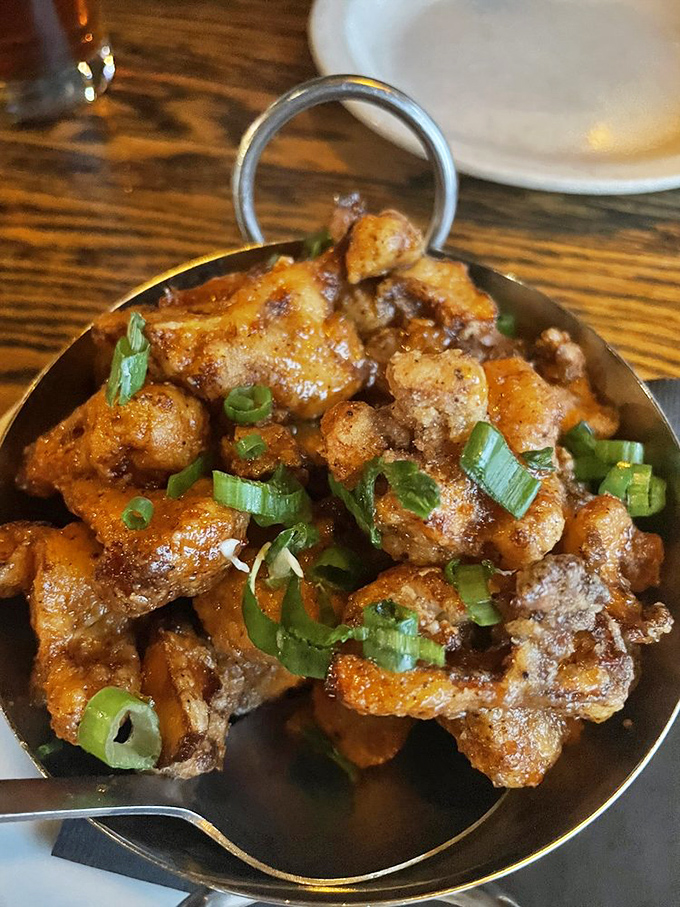 These aren't your average buffalo wings &ndash; they're crispy, saucy little flavor bombs that disappear faster than you can say "another round."