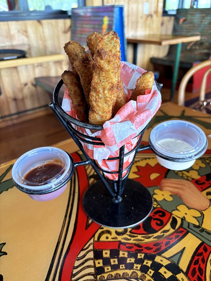 Fried pickles&mdash;where vinegary tang meets crispy coating in the appetizer equivalent of a perfect first date.