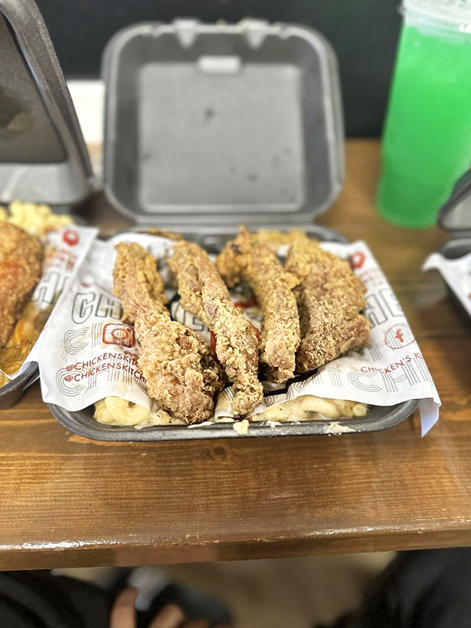 These fried pork ribs look like they've been given a golden ticket to flavor town. The mac and cheese is just showing off at this point.