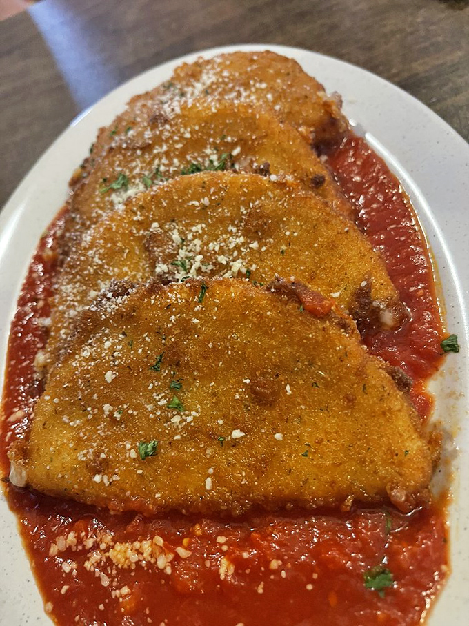 Fried provolone that makes mozzarella sticks look like amateurs. Golden-brown, crispy exterior giving way to a molten cheese center&mdash;pure indulgence on a plate.