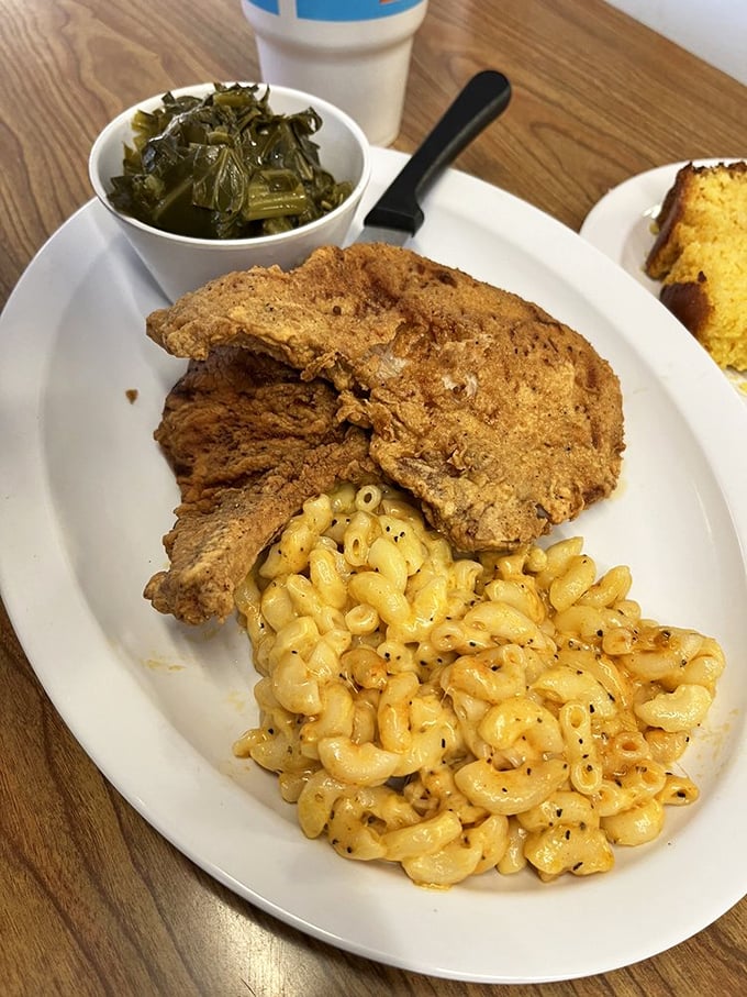 Fried pork chops paired with mac and cheese that would make your grandmother jealous of the recipe. 