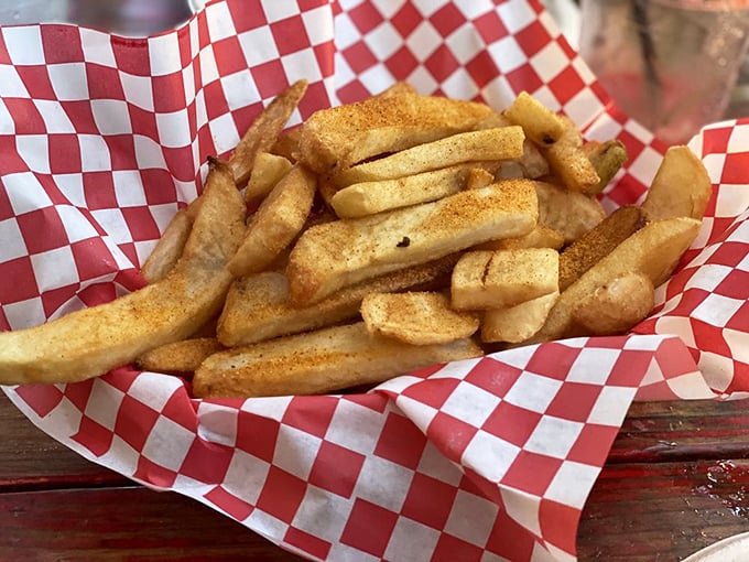 These aren't just fries&mdash;they're the supporting actors that deserve their own Oscar, dusted with seasoning and served in classic checkered paper.