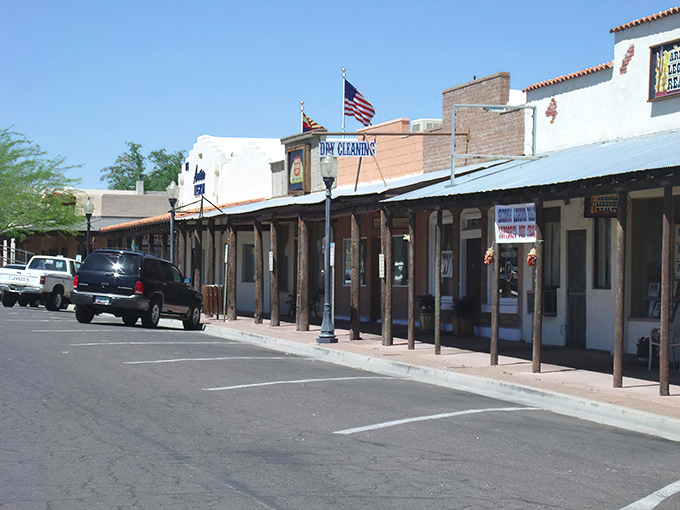 Frontier Street's covered walkways offer blessed shade while you browse&mdash;because even cowboys knew shopping was better without sunburn.