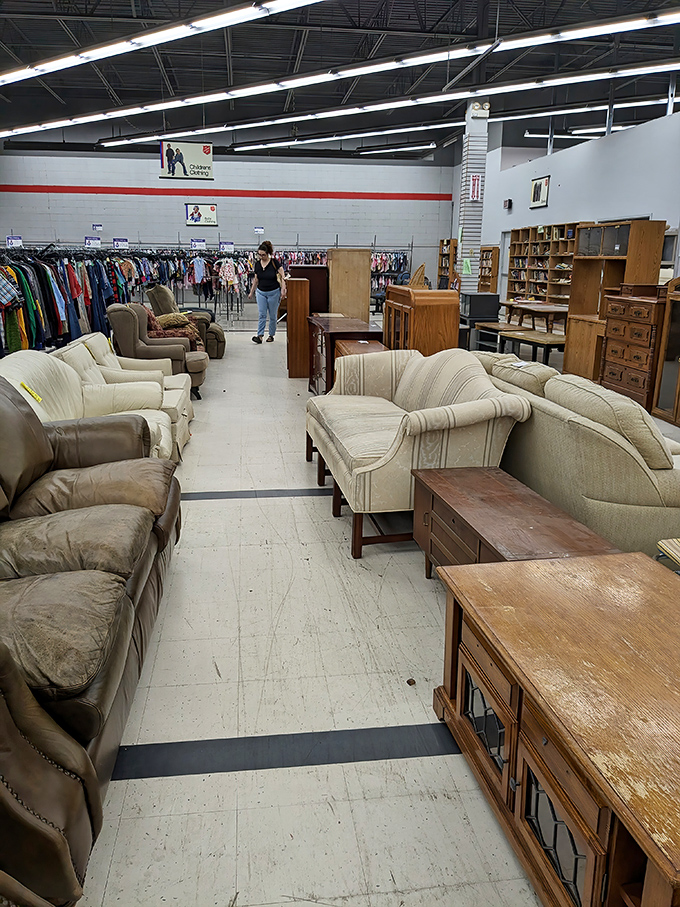 Living room time capsules line the furniture section. That sofa might have witnessed family game nights and TV marathons before finding its way here.