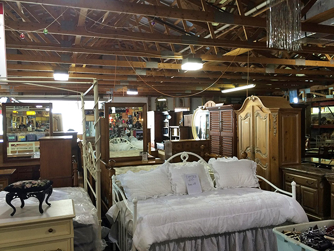 Elegantly staged bedroom furniture creates tiny islands of domestic tranquility&mdash;that white daybed practically whispers "curl up with a book and forget your to-do list."