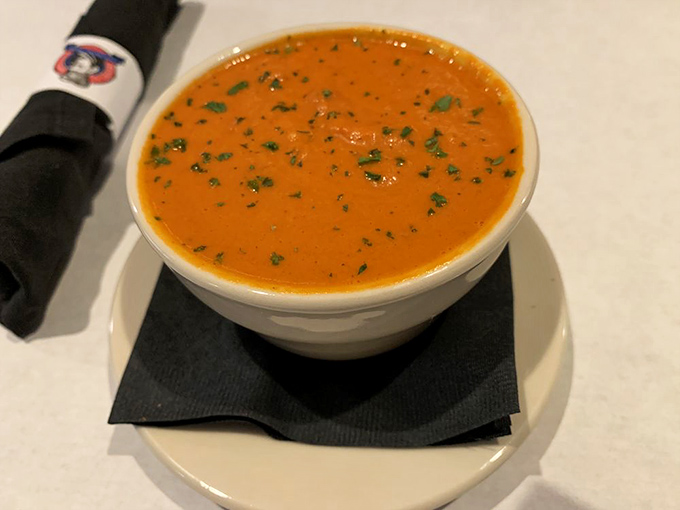 Gouda cheese soup that's basically a warm hug in a bowl. The vibrant color promises&mdash;and delivers&mdash;comfort that transcends mere sustenance.