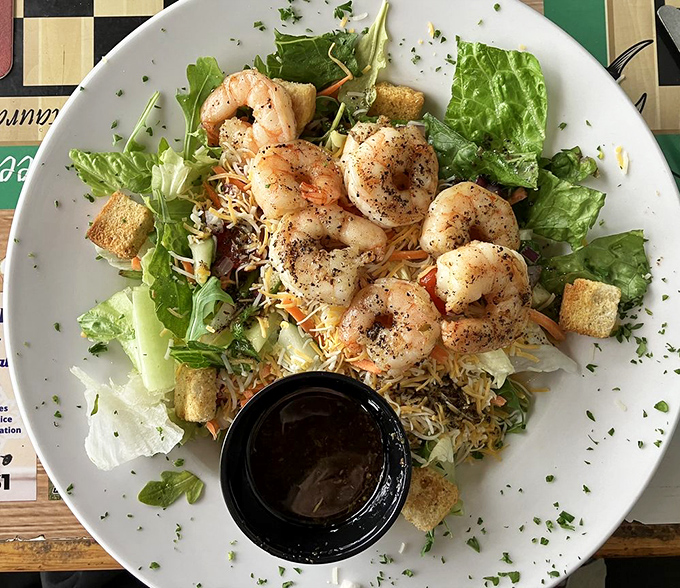 A salad that doesn't apologize for being healthy because those plump grilled shrimp are doing all the talking. Garden-fresh with ocean benefits.