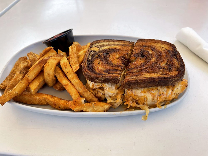 The Grouper Reuben rewrites sandwich history by replacing corned beef with Florida's favorite fish &ndash; a coastal revelation between perfectly grilled marble rye.