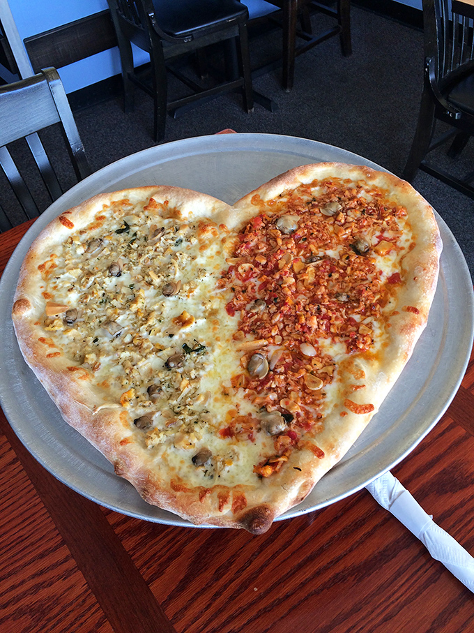 Love at first bite! This heart-shaped pizza proves romance isn't dead&mdash;it just needed more cheese and two distinct topping personalities.