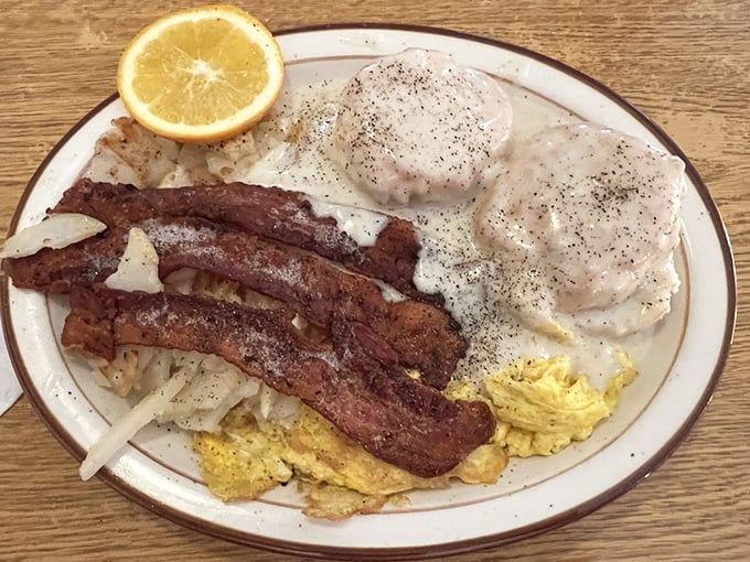 The breakfast special that makes alarm clocks worthwhile&mdash;crispy bacon, perfectly cooked eggs, and hash browns that didn't come from a freezer.