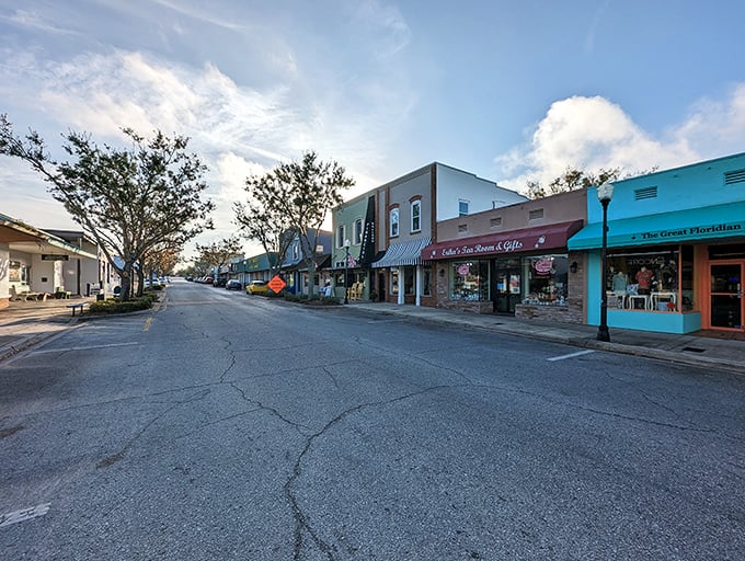 Historic Downtown Clermont at dusk has that Edward Hopper painting vibe&mdash;if Hopper had included palm trees and a shop selling "Florida Man" t-shirts.