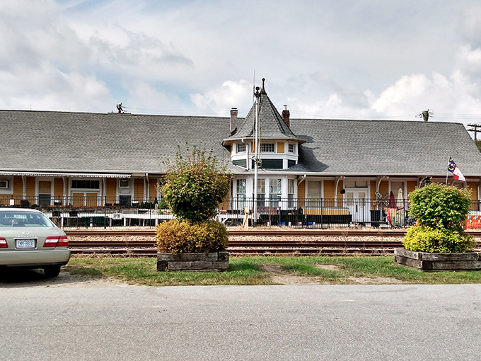 The historic railroad depot stands as a charming reminder of Hendersonville's past, now repurposed for new generations to enjoy.