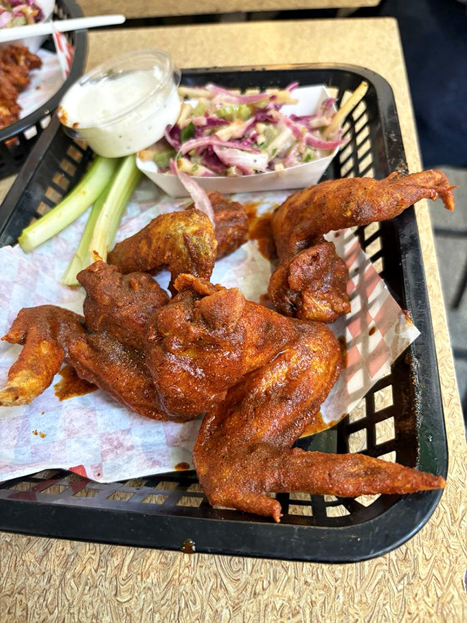 When your food needs a warning label. These wings aren't just hot - they're having-an-existential-conversation-with-your-taste-buds hot.
