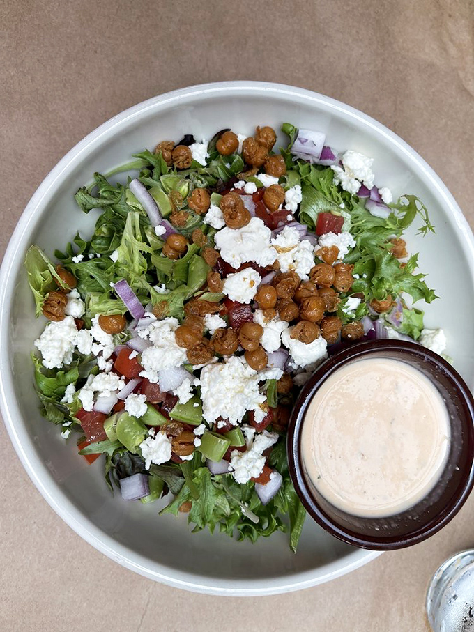Who knew healthy could look this good? A garden-fresh salad with crispy chickpeas and feta that doesn't feel like punishment.