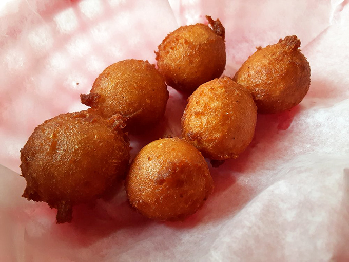 Golden-fried hushpuppies &ndash; little orbs of cornmeal perfection that were invented because someone brilliant said, "What if we fried cornbread batter?"