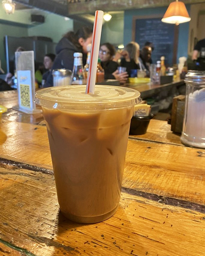 Their iced vanilla latte isn't just coffee&mdash;it's liquid motivation sitting on a wooden counter that's witnessed countless morning revelations.